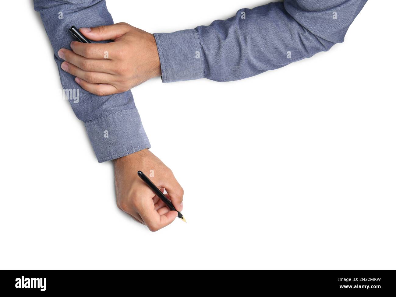 Man with pen on white background, top view. Closeup of hands Stock ...