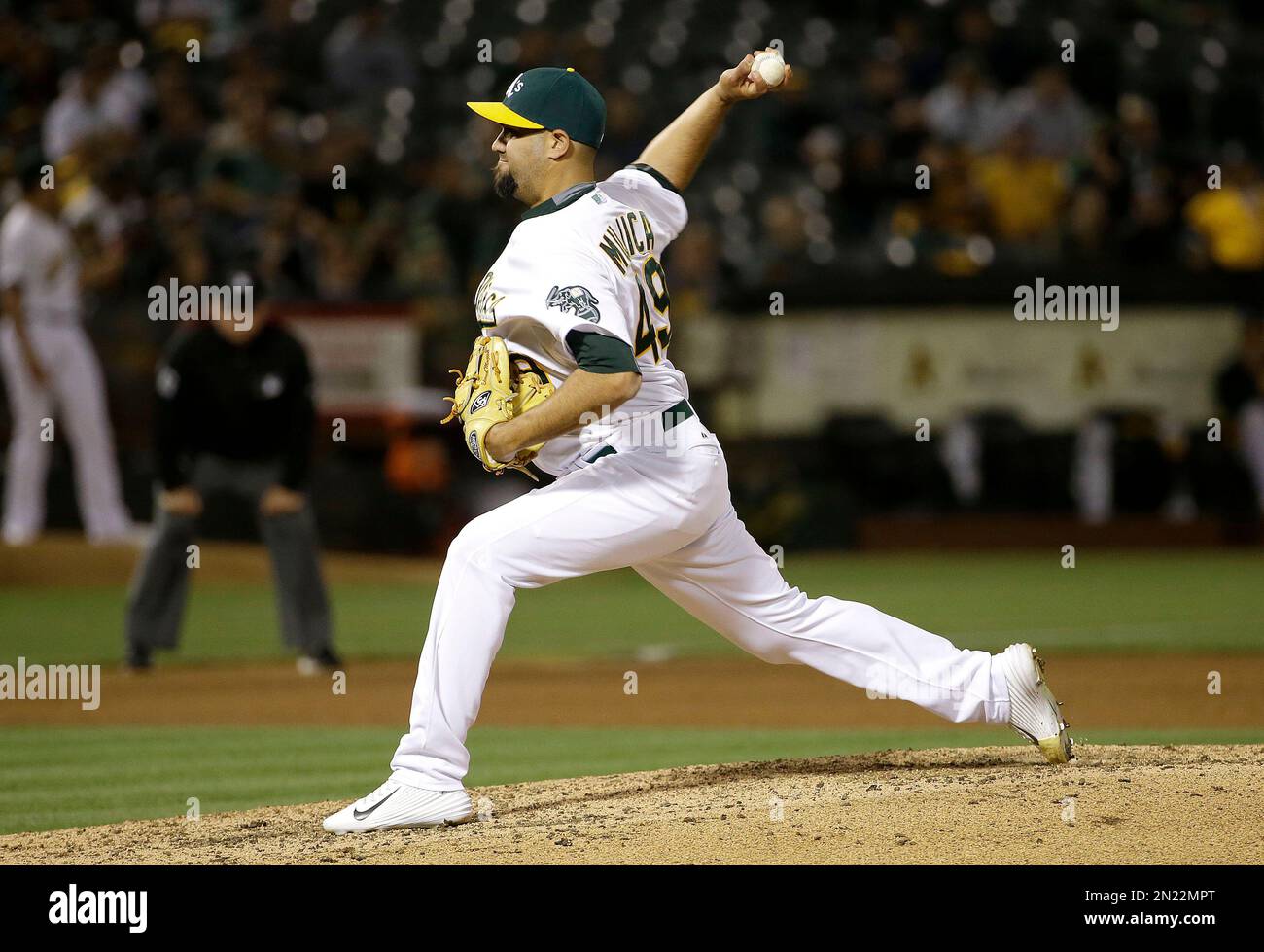 Oakland Athletics pitcher Edward Mujica throws against the Seattle ...
