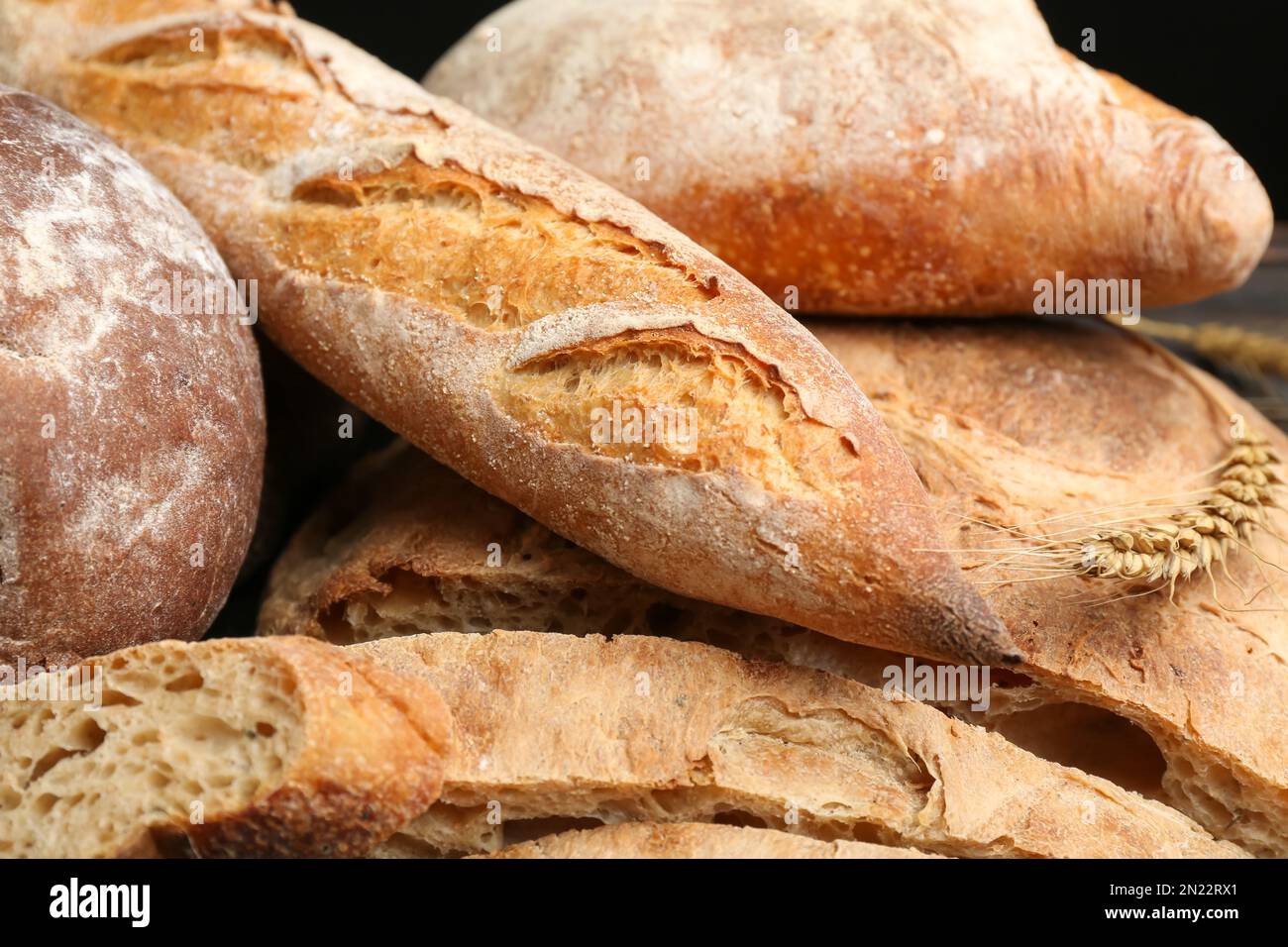 Different kinds of fresh bread as background, closeup Stock Photo - Alamy