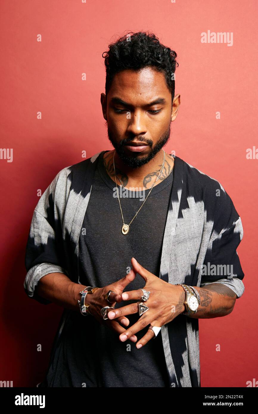 Grammy award-winning singer, songwriter and producer, Miguel poses for ...