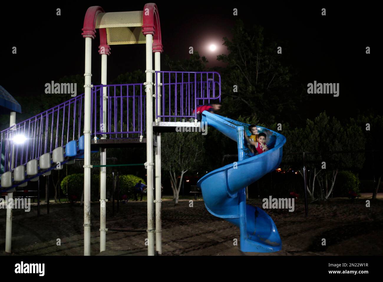 In this picture taken Wednesday, July 1, 2015, Egyptian children play ...