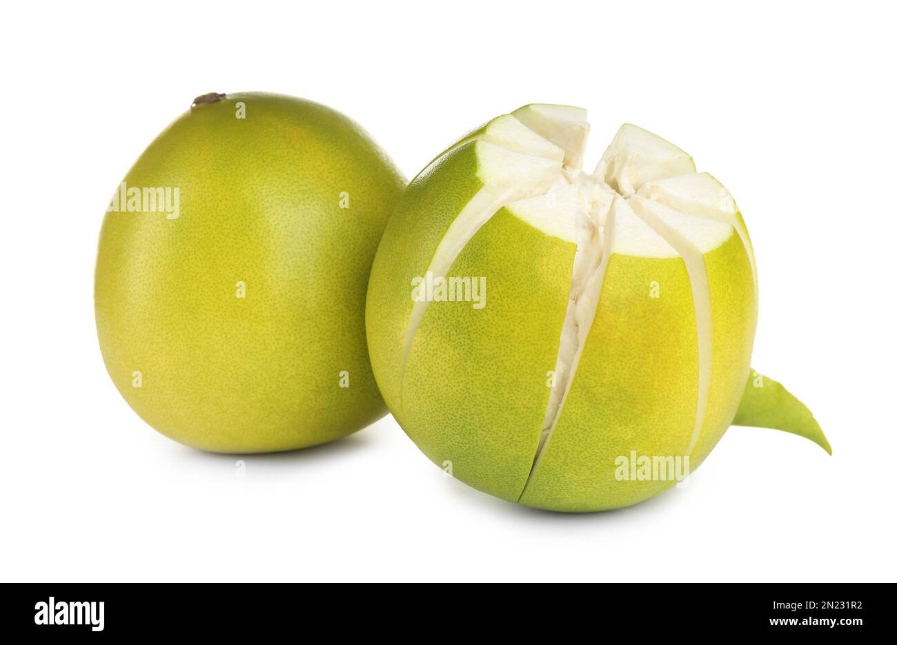 Fresh tropical pomelo fruits isolated on white Stock Photo - Alamy