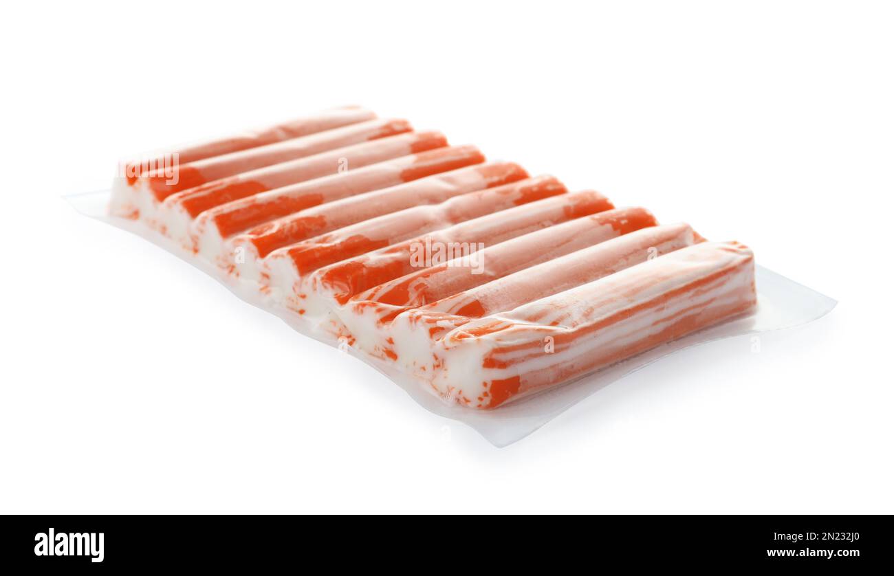 Delicious crab sticks in plastic packaging isolated on white Stock ...