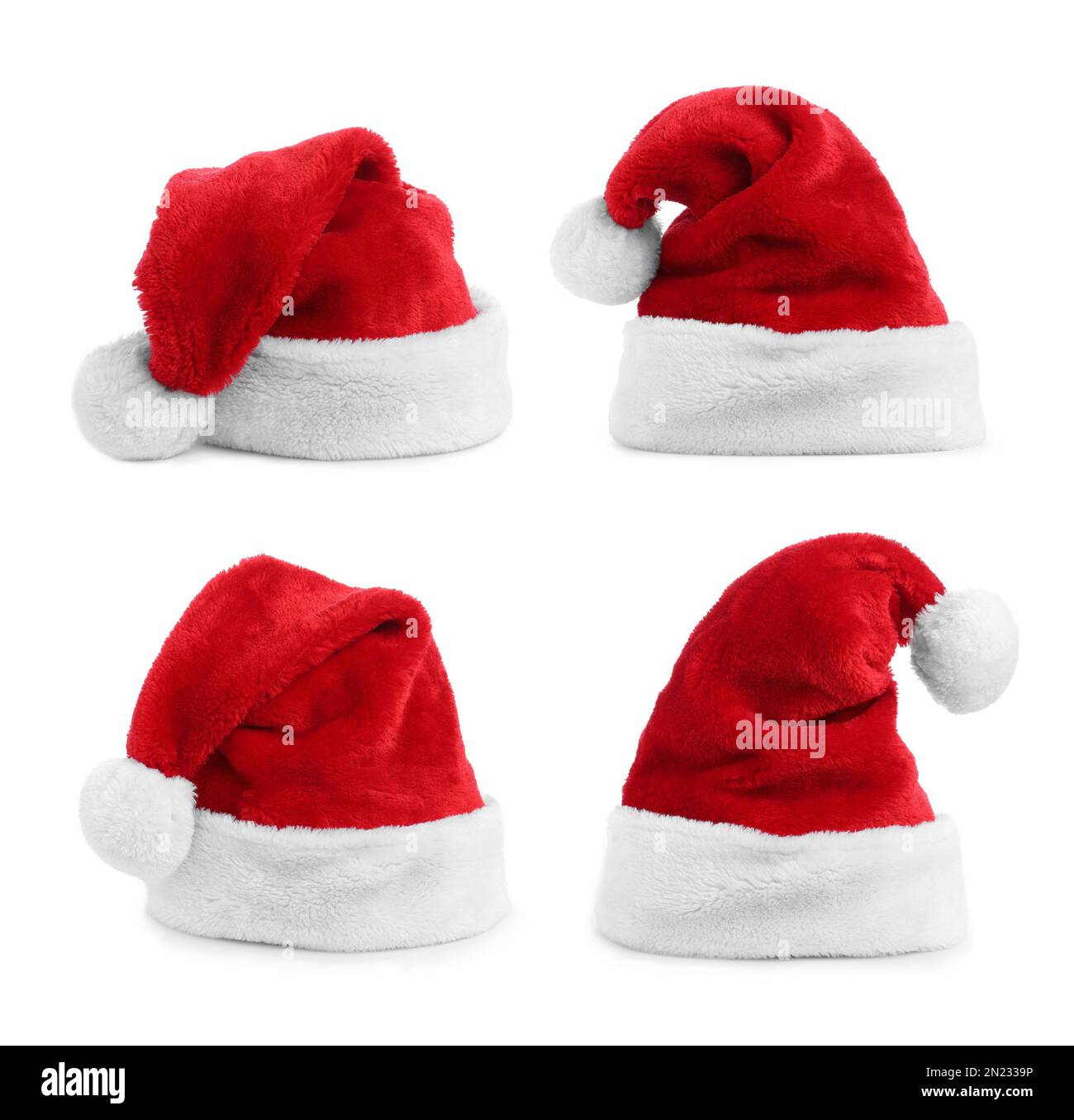 Set of red Santa hats on white background Stock Photo - Alamy