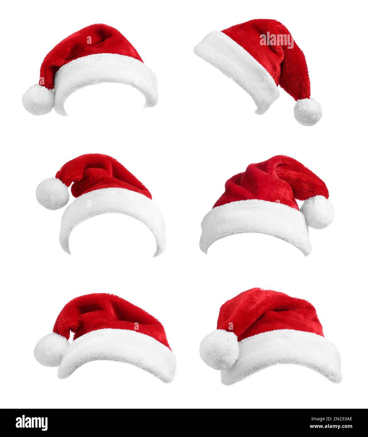 Set of red Santa hats on white background Stock Photo - Alamy