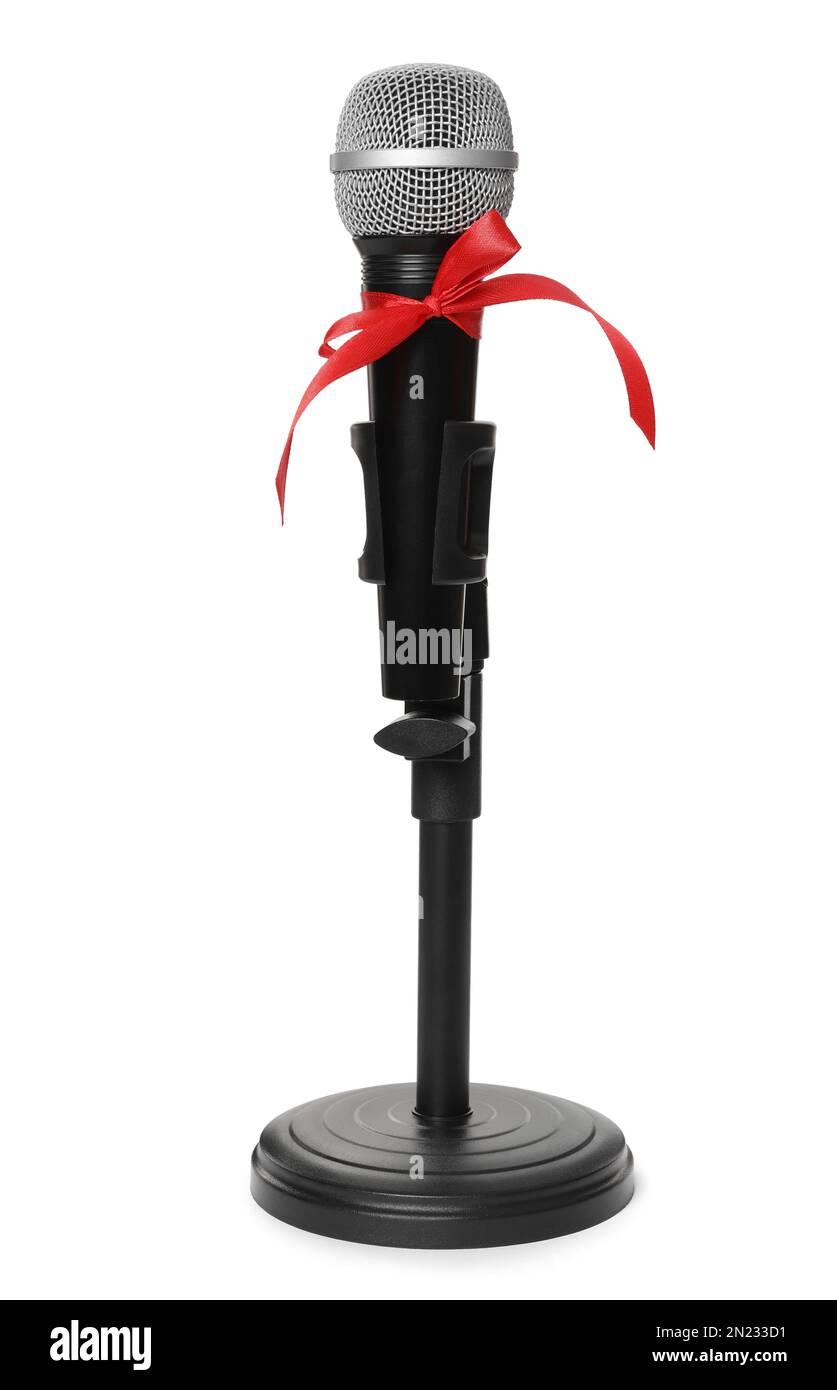 Microphone with red bow isolated on white. Christmas music Stock Photo ...