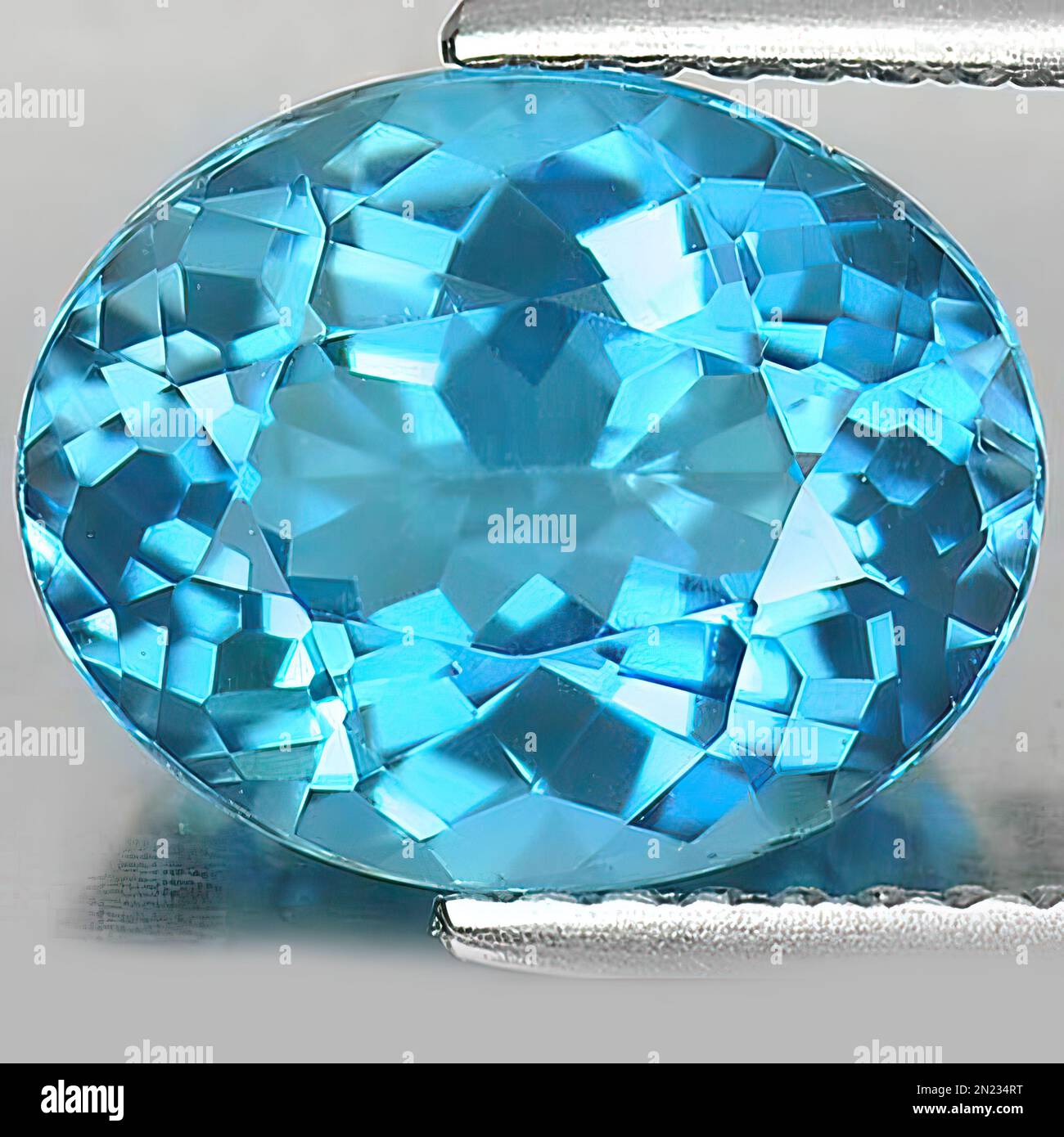 Natural gem blue topaz on white background Stock Photo - Alamy