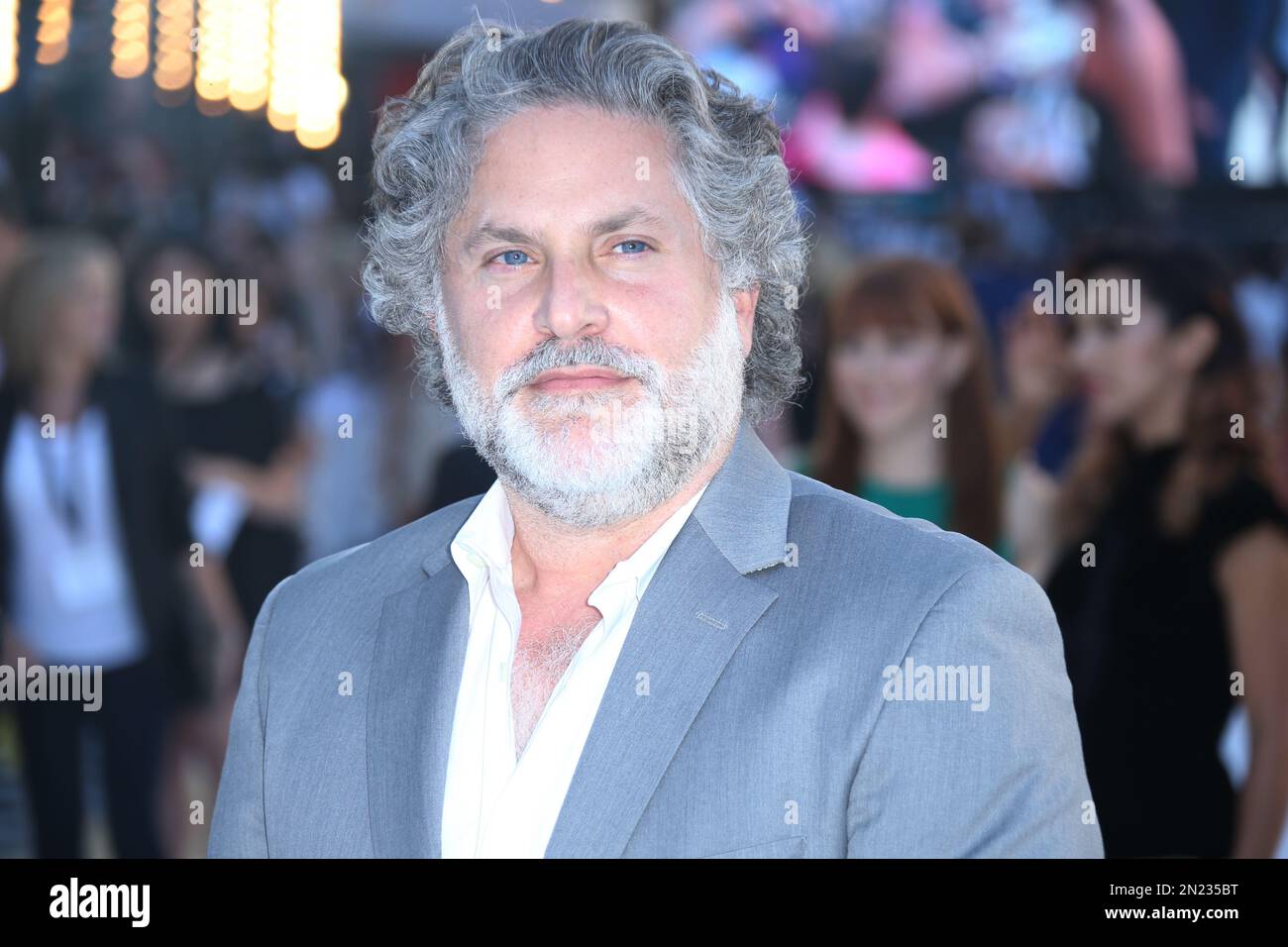 Gregory Jacobs poses for photographers upon arrival at the Magic Mike ...