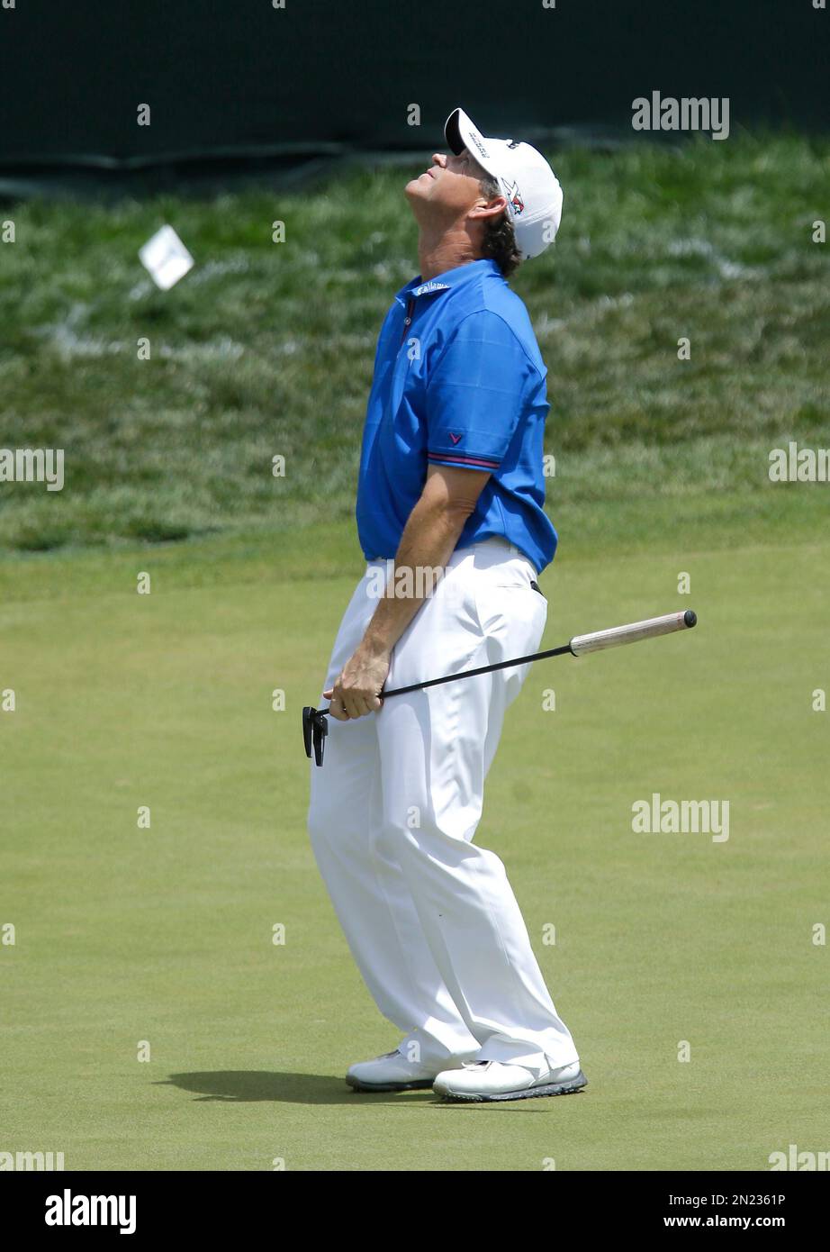 Lee Janzen looks skyward after missing a putt in the final round of the ...