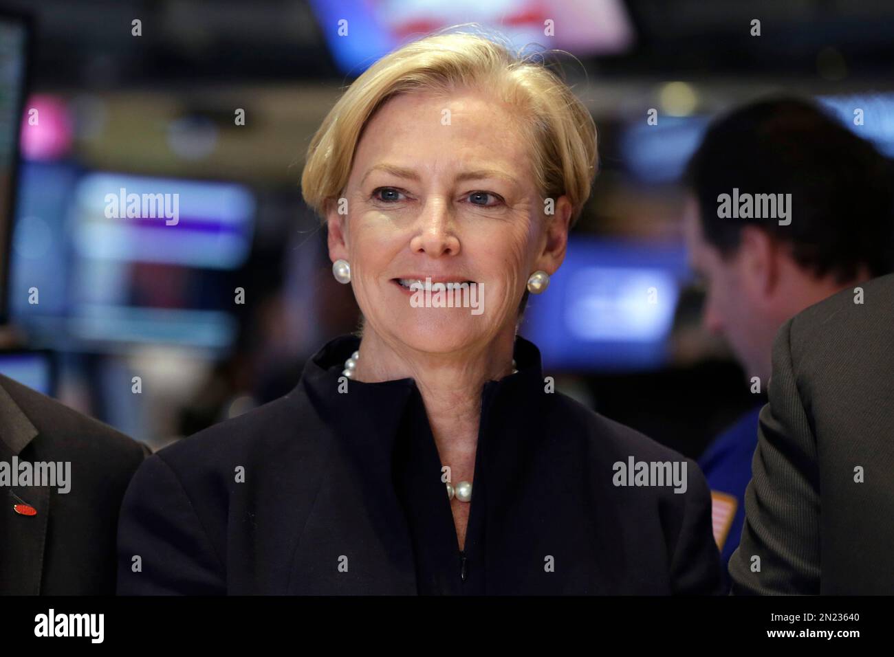 Chair and CEO of DuPont Ellen Kullman, poses for photos after ringing ...
