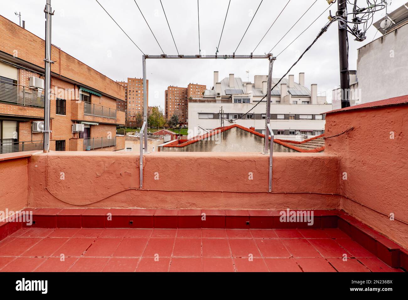 roof of a building with slabs covered with anti-damp primer and ropes ...