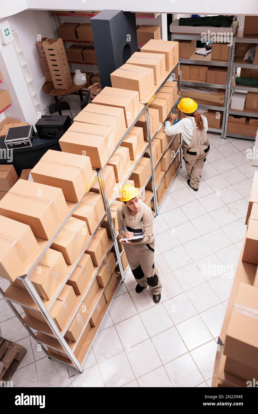 Warehouse top view workers boxes hi-res stock photography and images - Alamy
