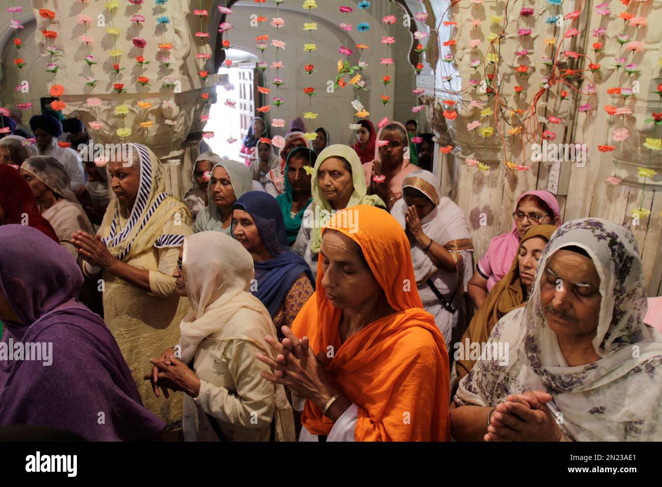 Sikh pilgrims attend a religious congregation of Maharaja Ranjit Singh ...