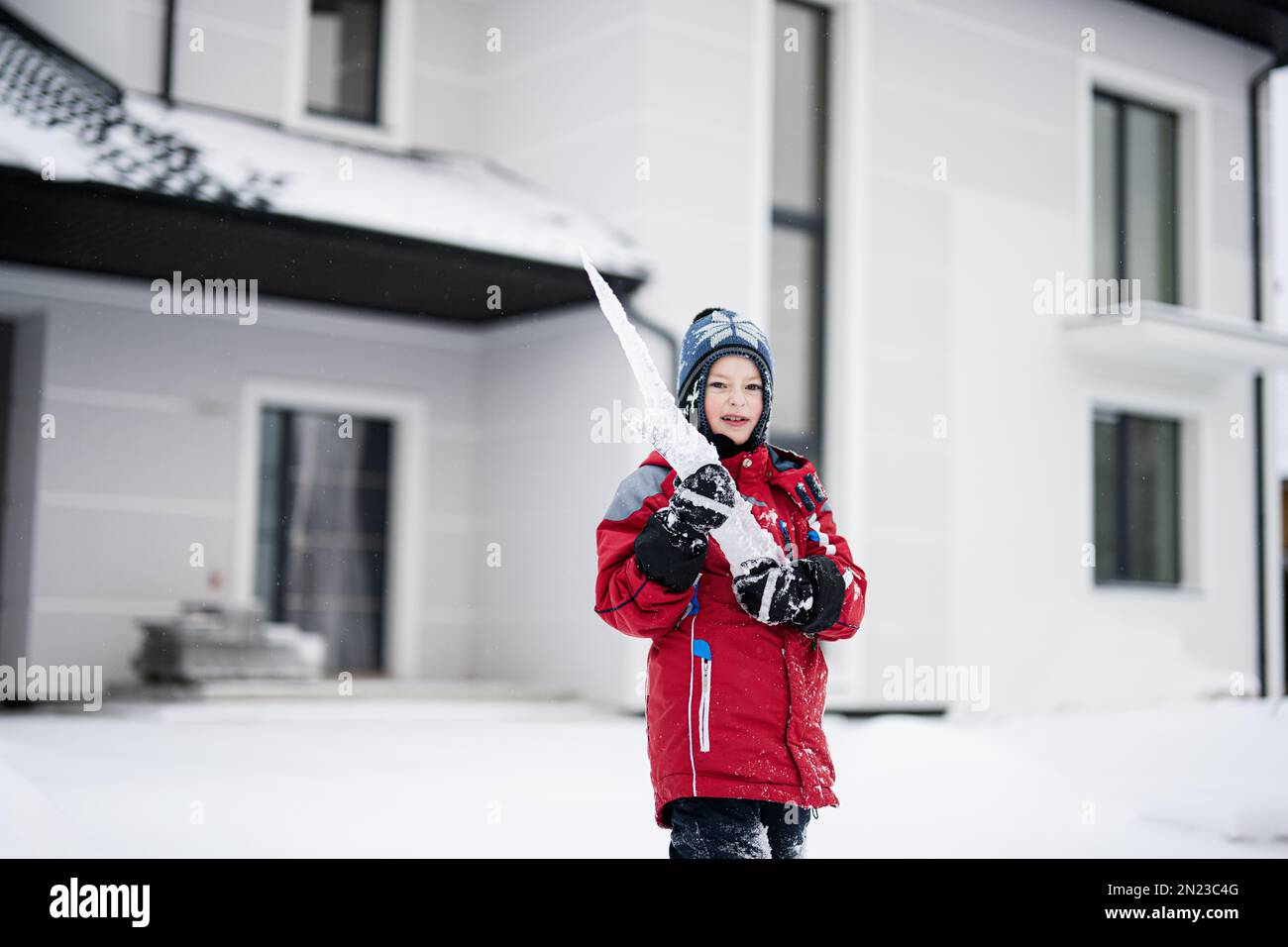 Boy winter pose hi-res stock photography and images - Alamy
