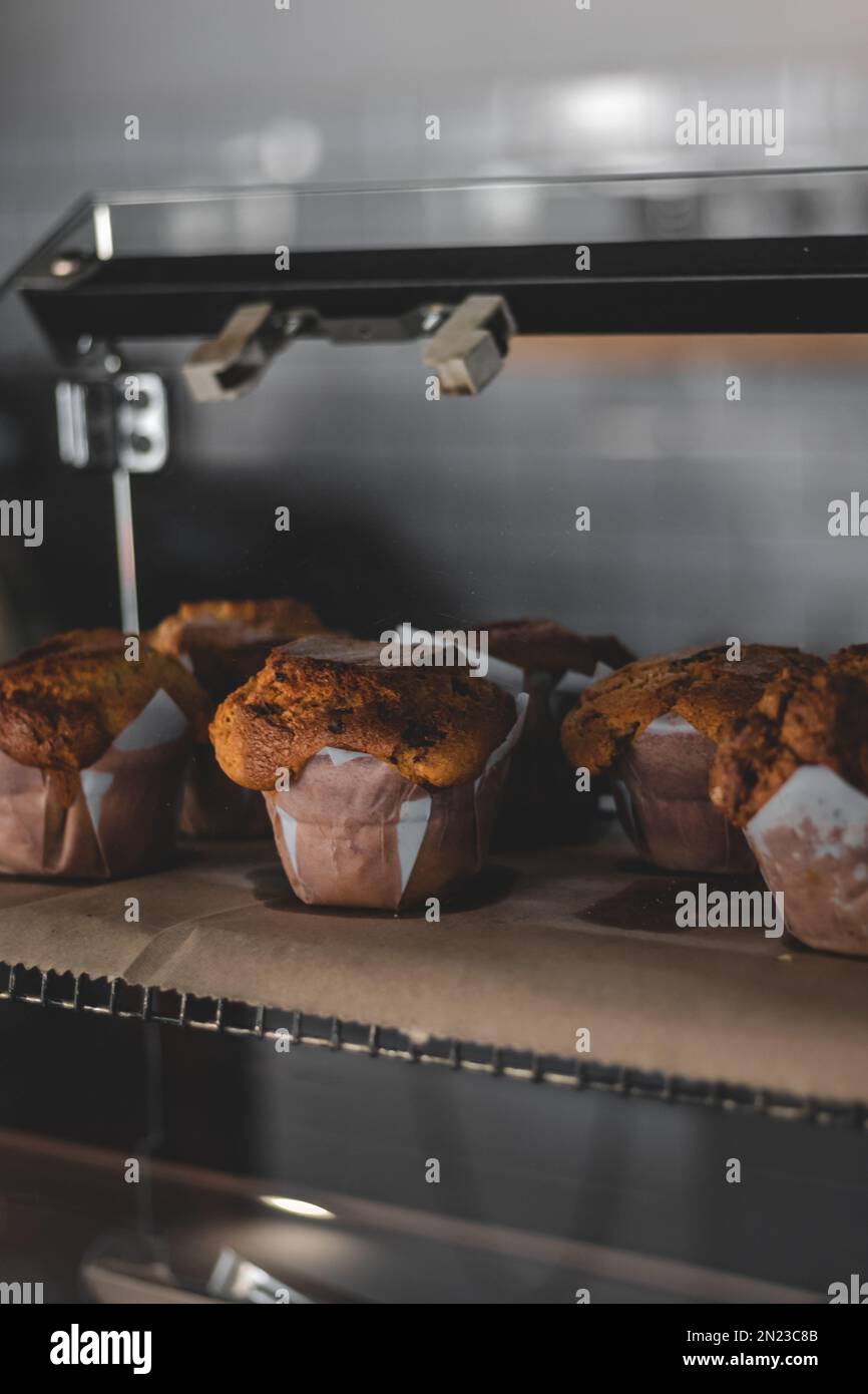 counter of muffins in a café in town Stock Photo - Alamy