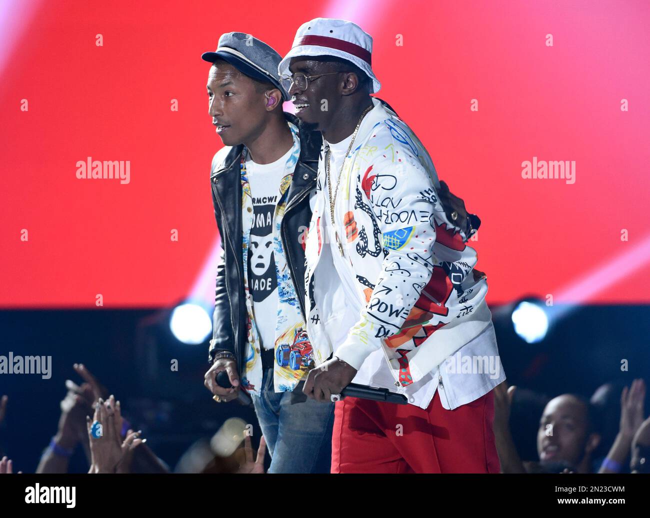 Pharrell Williams, left, and Sean "Diddy" Combs perform at the BET ...