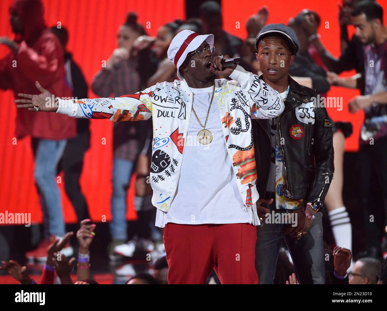 Sean "Diddy" Combs, left, and Pharrell Williams perform at the BET ...