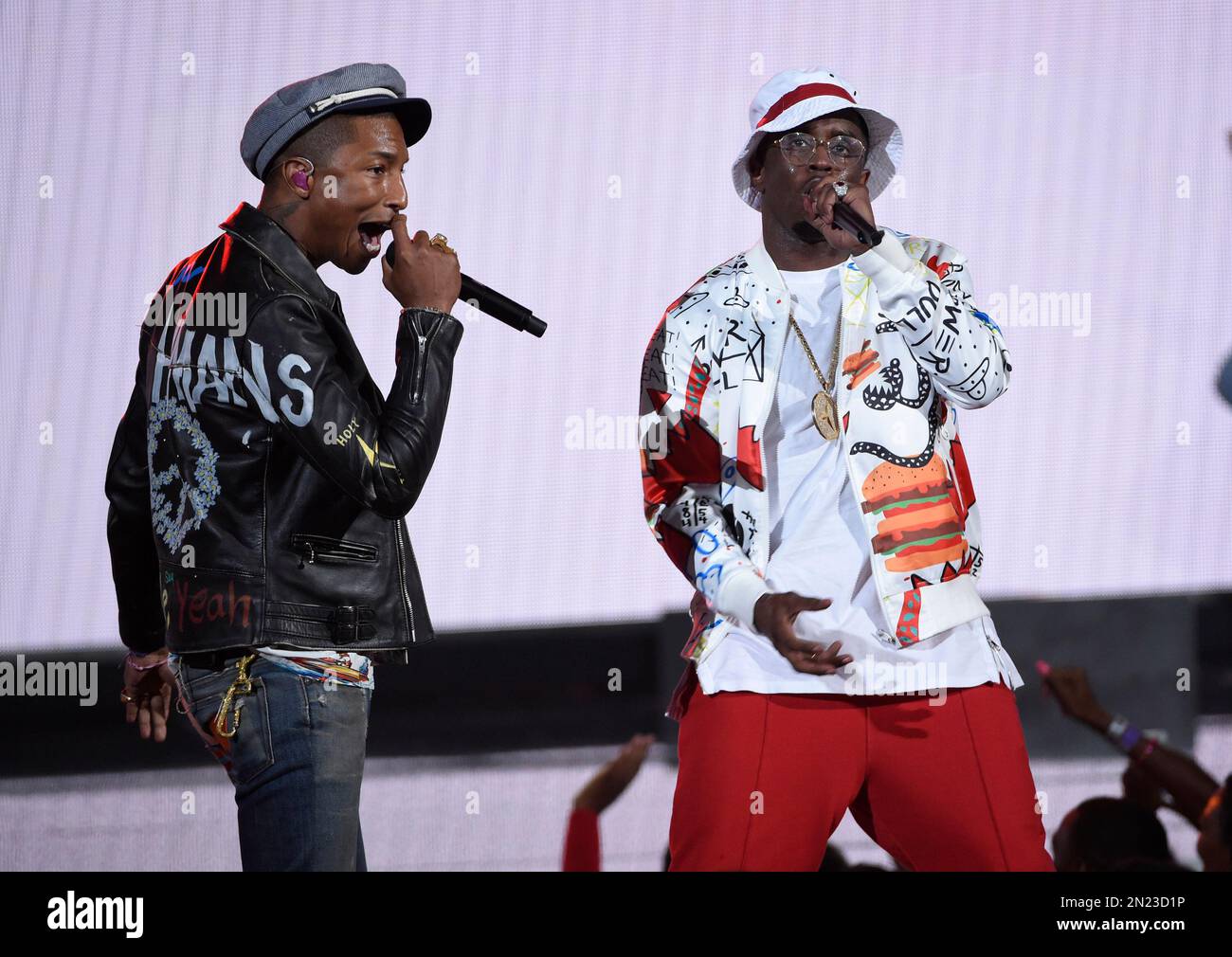 Pharrell Williams, left, and Sean "Diddy" Combs perform at the BET ...