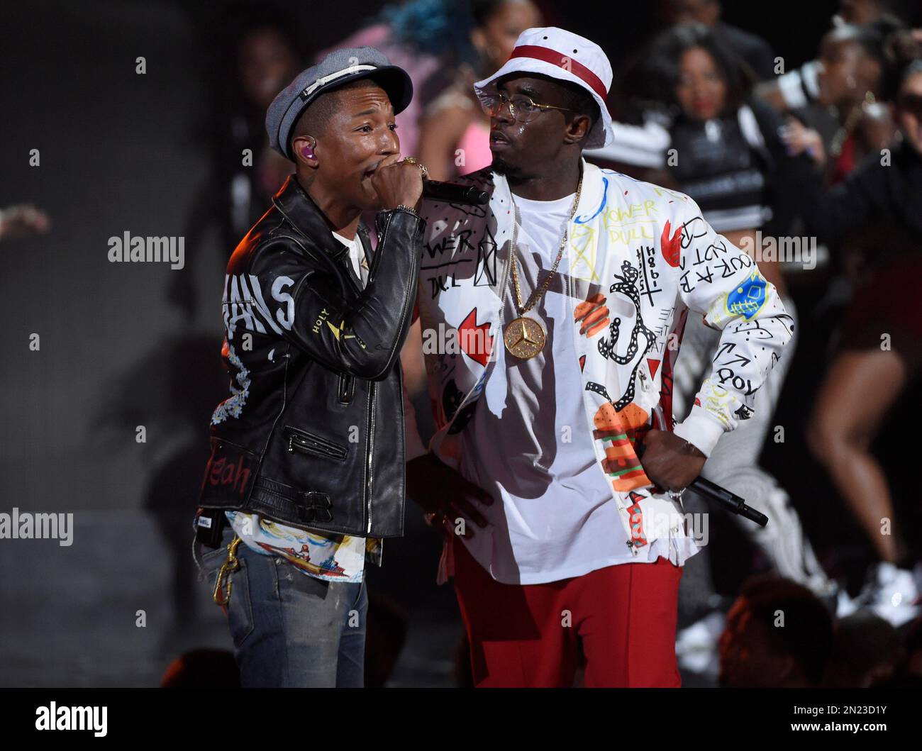 Pharrell Williams, left, and Sean "Diddy" Combs perform at the BET ...