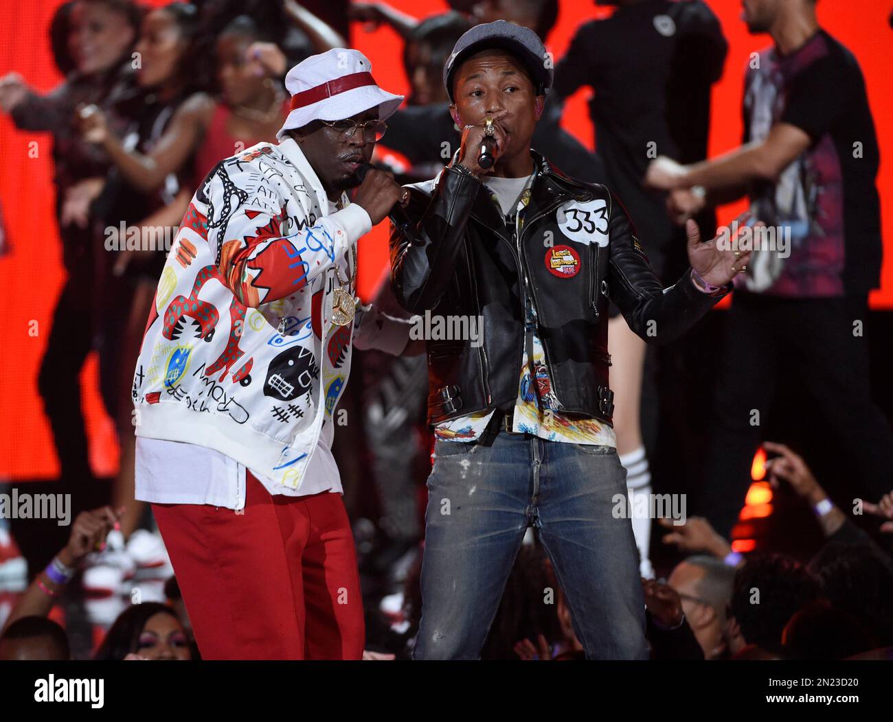 Sean "Diddy" Combs, left, and Pharrell Williams perform at the BET ...