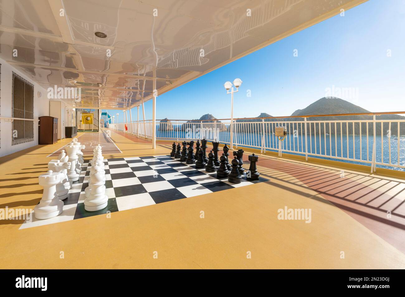 A large, giant size checker or chess board with black and white chess ...