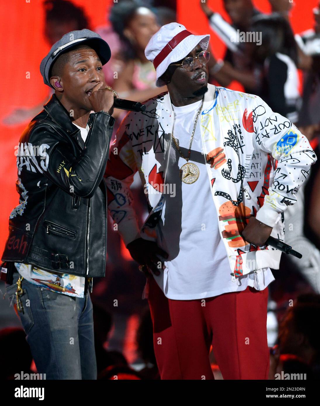 Pharrell Williams, left, and Sean "Diddy" Combs perform at the BET ...