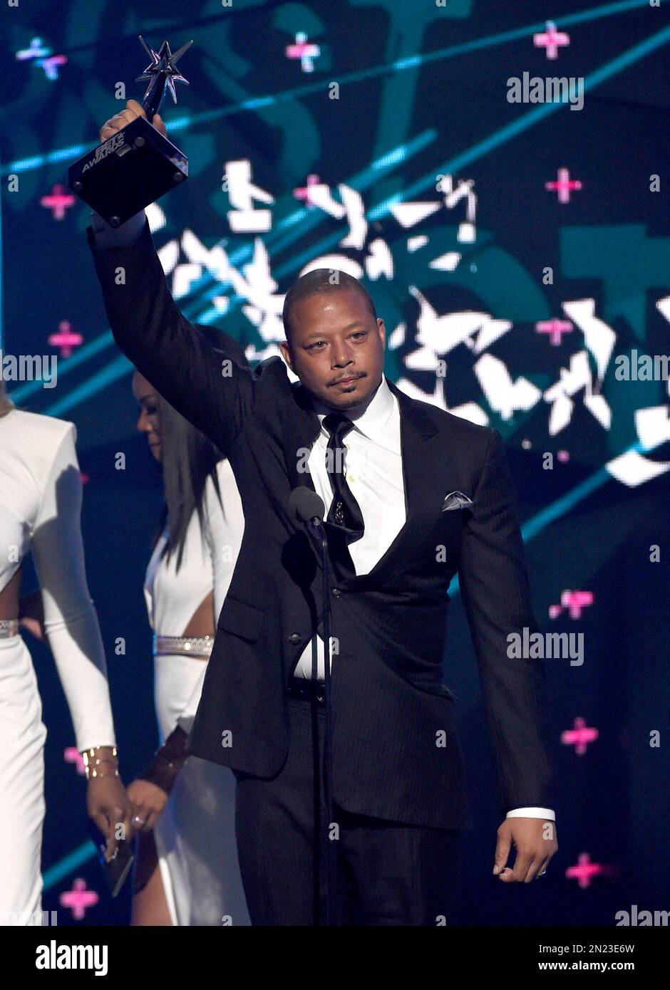 Terrence Howard accepts the award for best actor at the BET Awards at ...