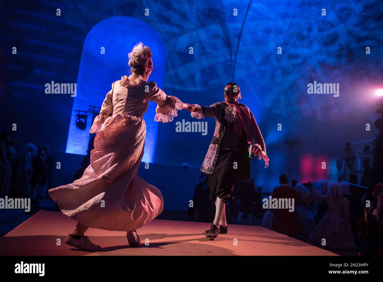 Costumed guests dance during the Great Masked Ball, in the Orangerie of ...