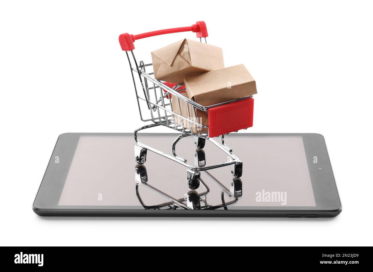 Internet shopping. Small cart with boxes and modern tablet on white ...