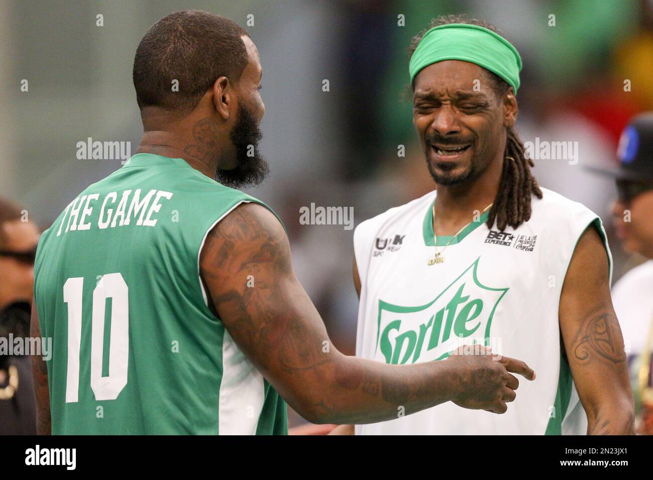 The Game, left, and Snoop Dogg play in the Sprite Celebrity Basketball ...