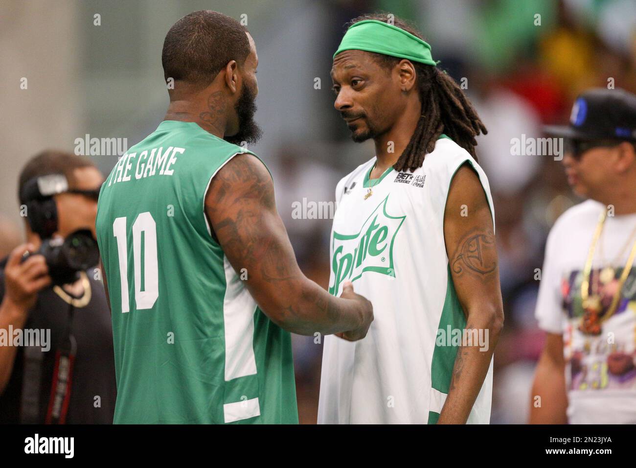 The Game, left, and Snoop Dogg play in the Sprite Celebrity Basketball ...