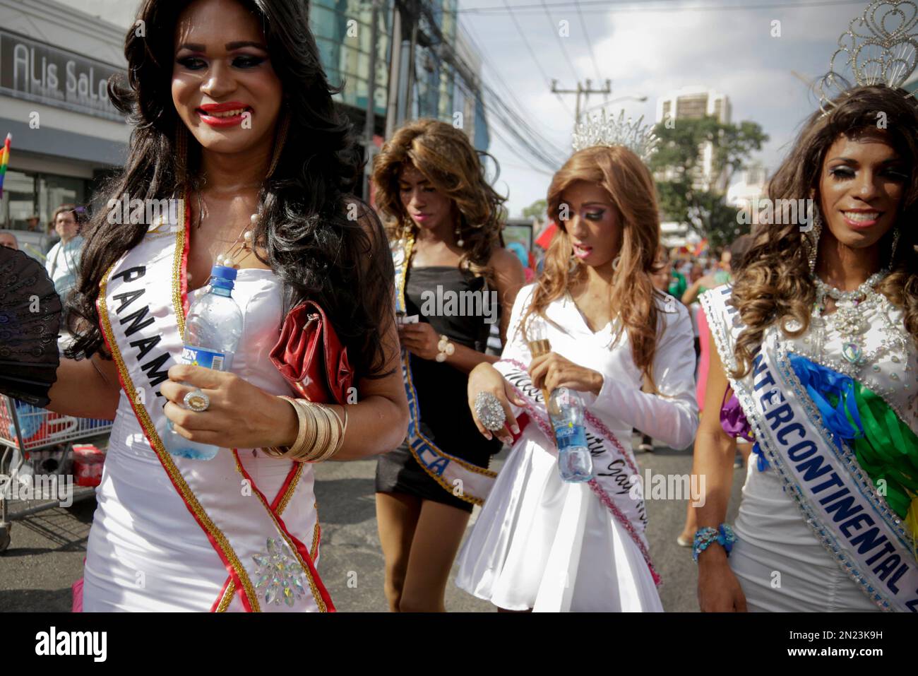 A group of transvestite beauty queens march in the gay pride parade in ...