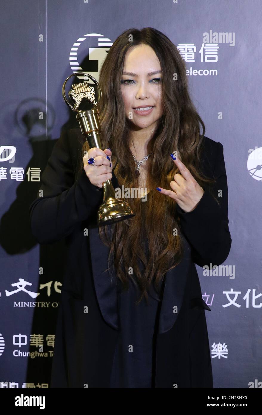 Taiwanese singer A-Mei holds her award for the Best Female Mandarin ...