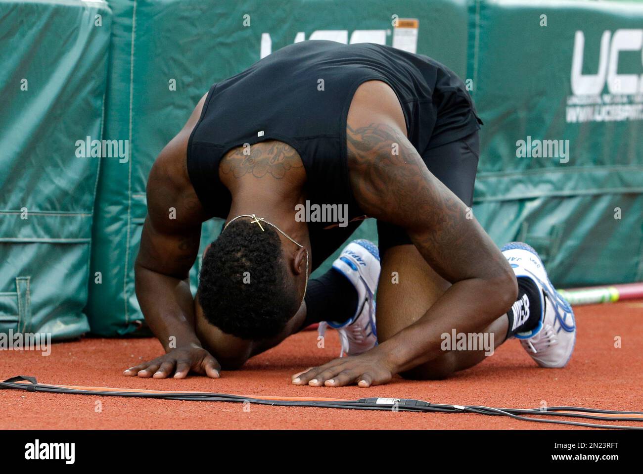 Ricky Robinson reacts after missing his last jump to finish seventh in ...