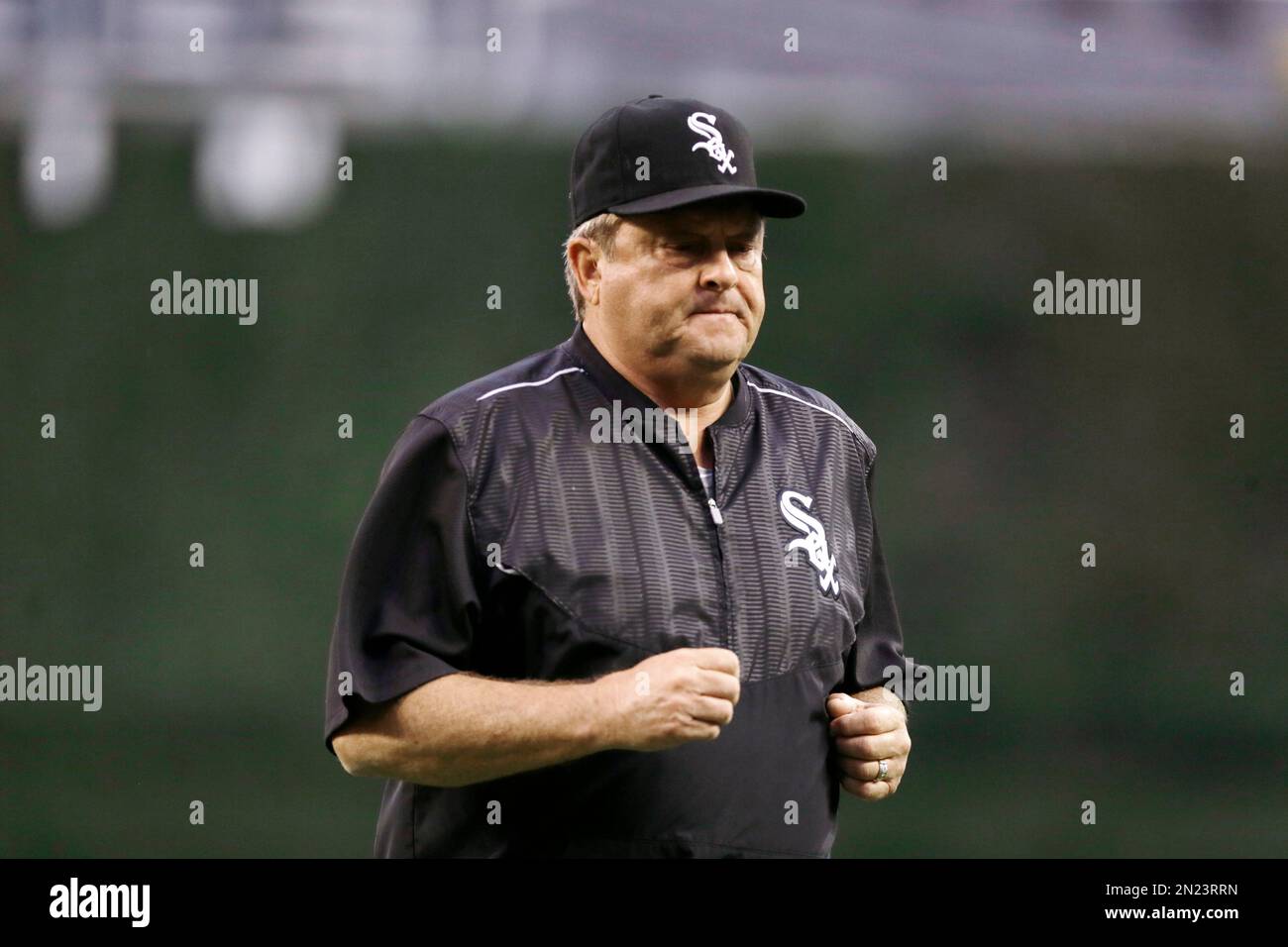 Chicago White Sox pitching coach Don Cooper returns to the dugout after ...