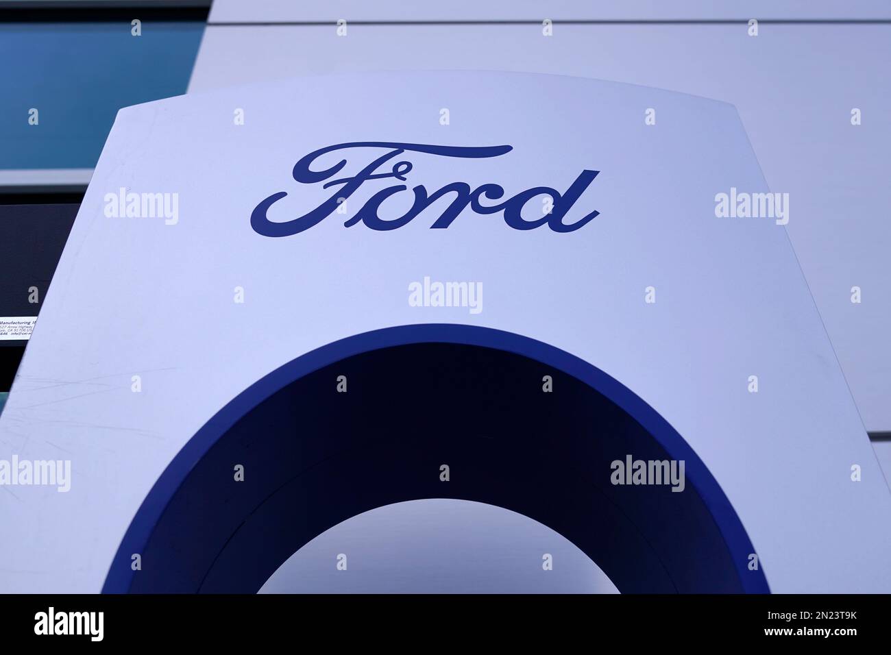 The Ford logo is displayed on an electric vehicle charging station at a ...