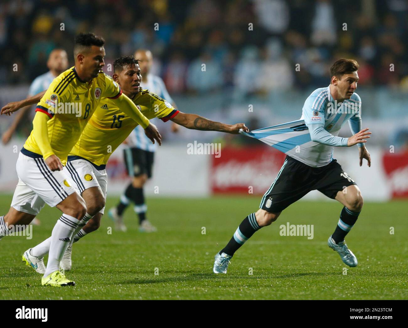 Colombia's Alexander Mejia tries to stop Argentina's Lionel Messi by ...