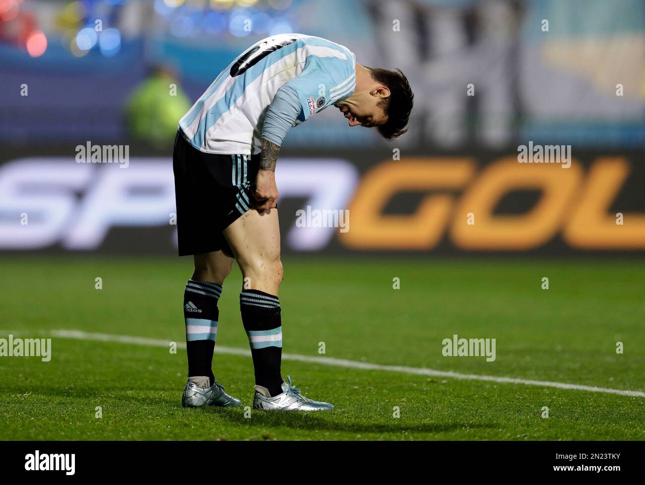 Argentina's Lionel Messi checks his thigh during a Copa America ...