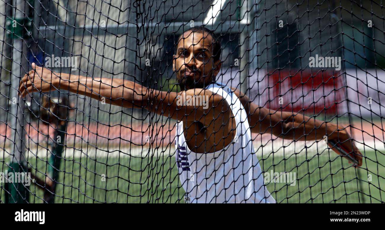Jeremy Taiwo throws the discus in the decathlon competition at the U.S ...
