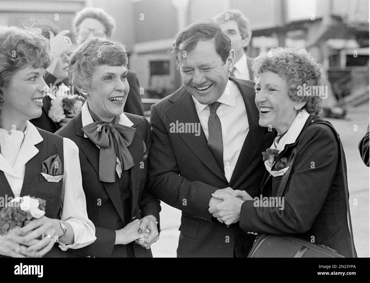 For Hyatt Corp president Jay Pritzker, center, and Braniff flight ...