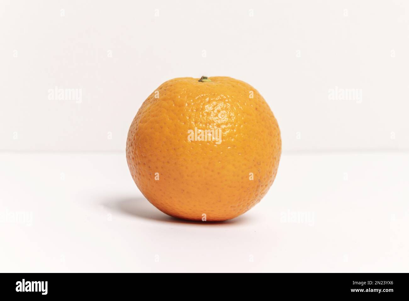 A delicious whole orange with its characteristic rough skin Stock Photo ...