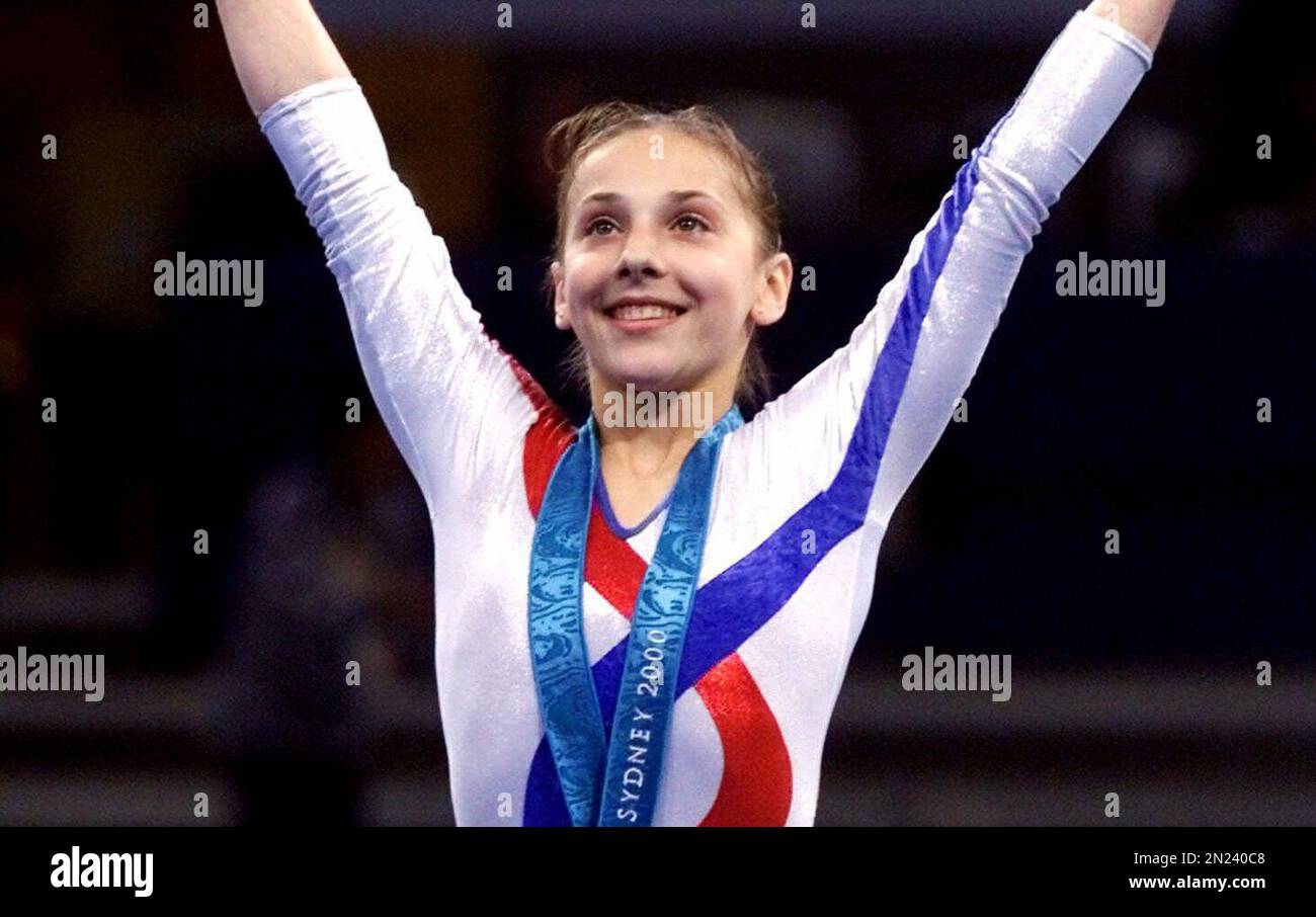 FILE - In this Thursday, Sept. 21, 2000 file photo, Andreea Raducan of ...