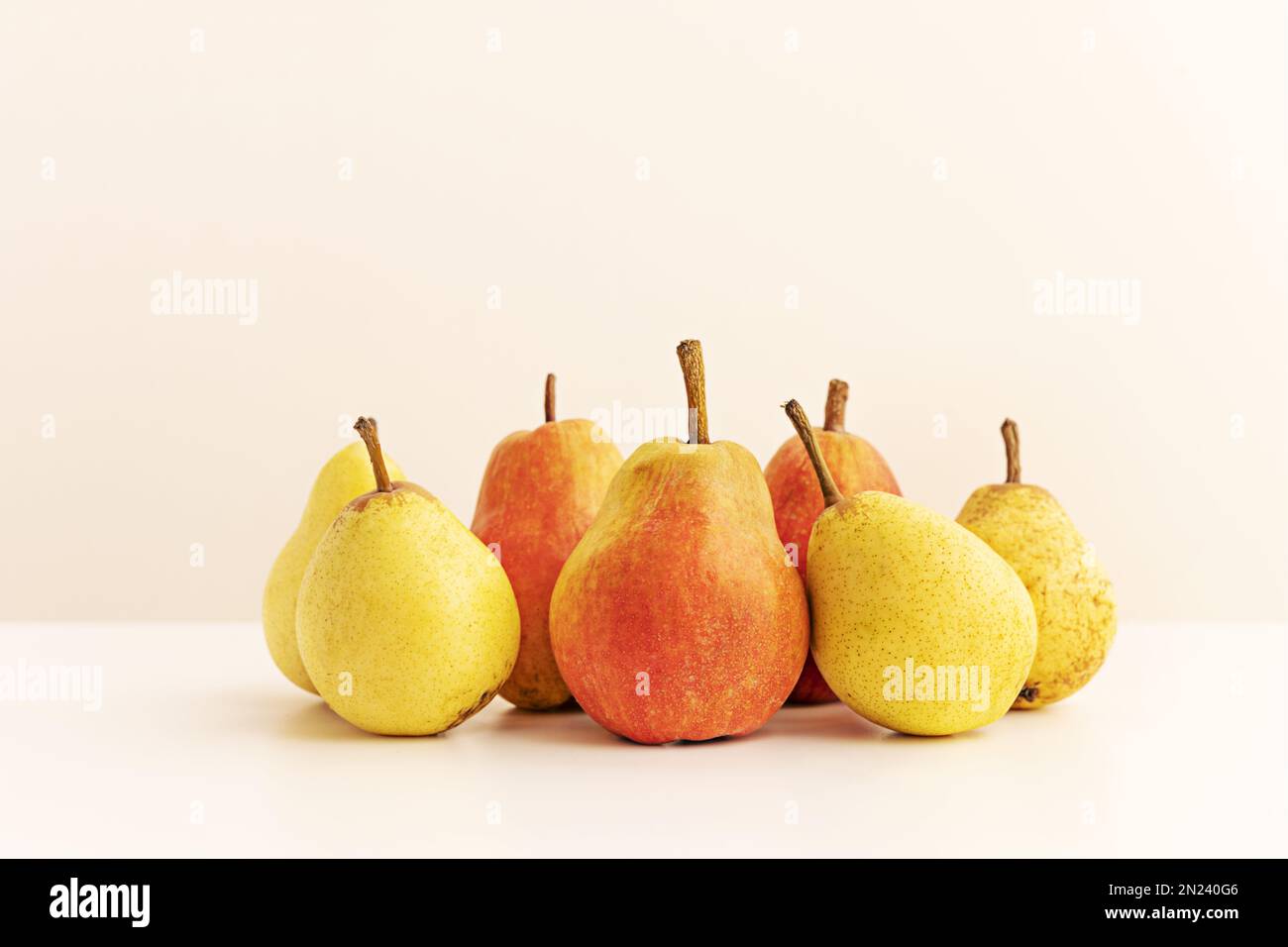 A bunch of fresh ripe pears of two kinds with their stems up Stock ...