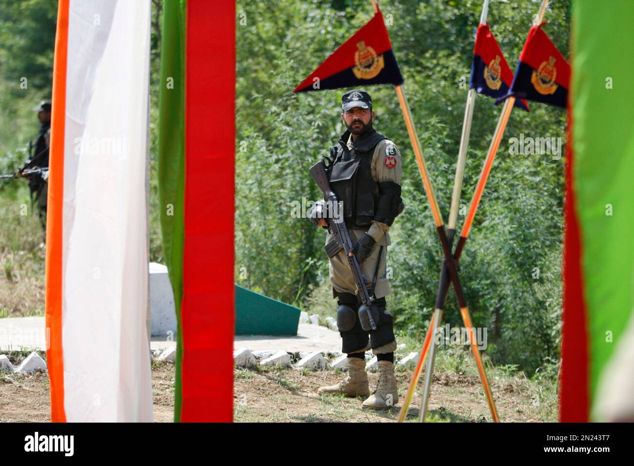 A Pakistani ranger stands during an annual fair at the international ...