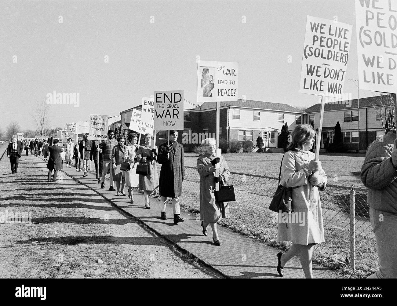 Pickets from various peace organizations protest the nation's role in ...