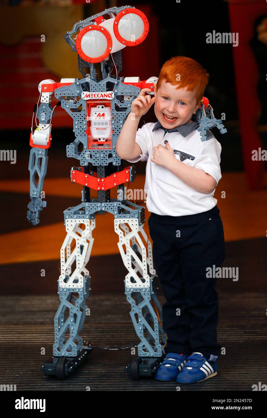 Tristan Robertson Jeyes, 4, gets a hug from a Meccanoid G15 KS robot ...