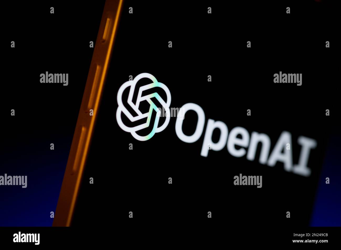 The OpenAI logo is seen on a mobile device in this photo illustration ...