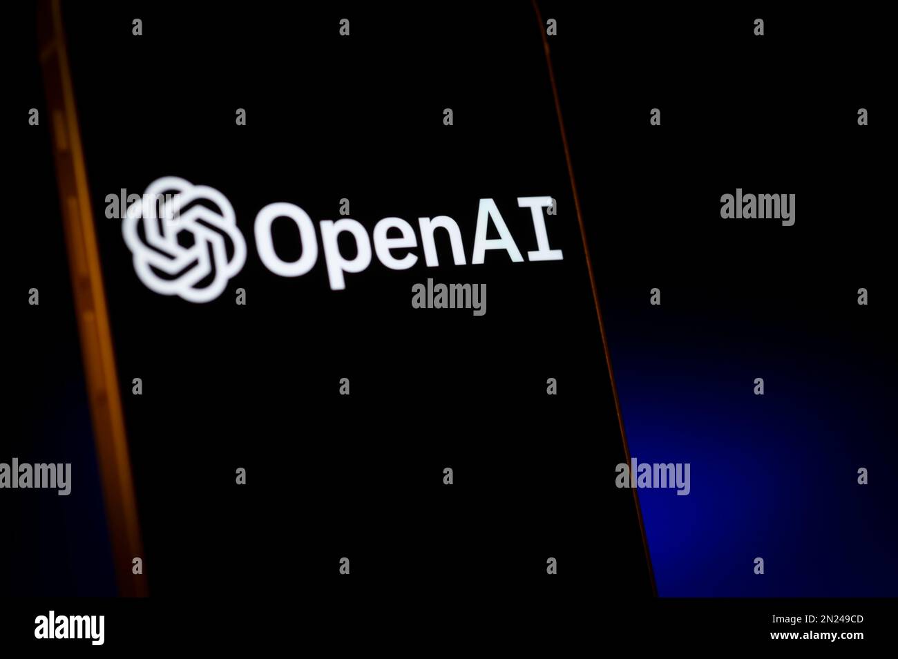The OpenAI logo is seen on a mobile device in this photo illustration ...
