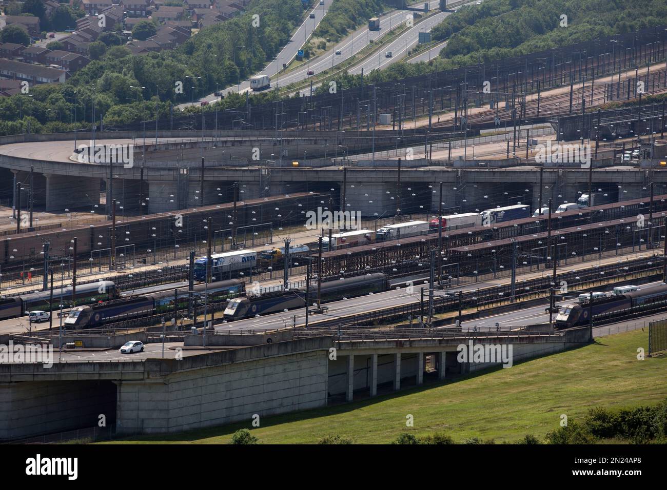 Lorries are loaded onto trains before entering the Channel Tunnel in ...