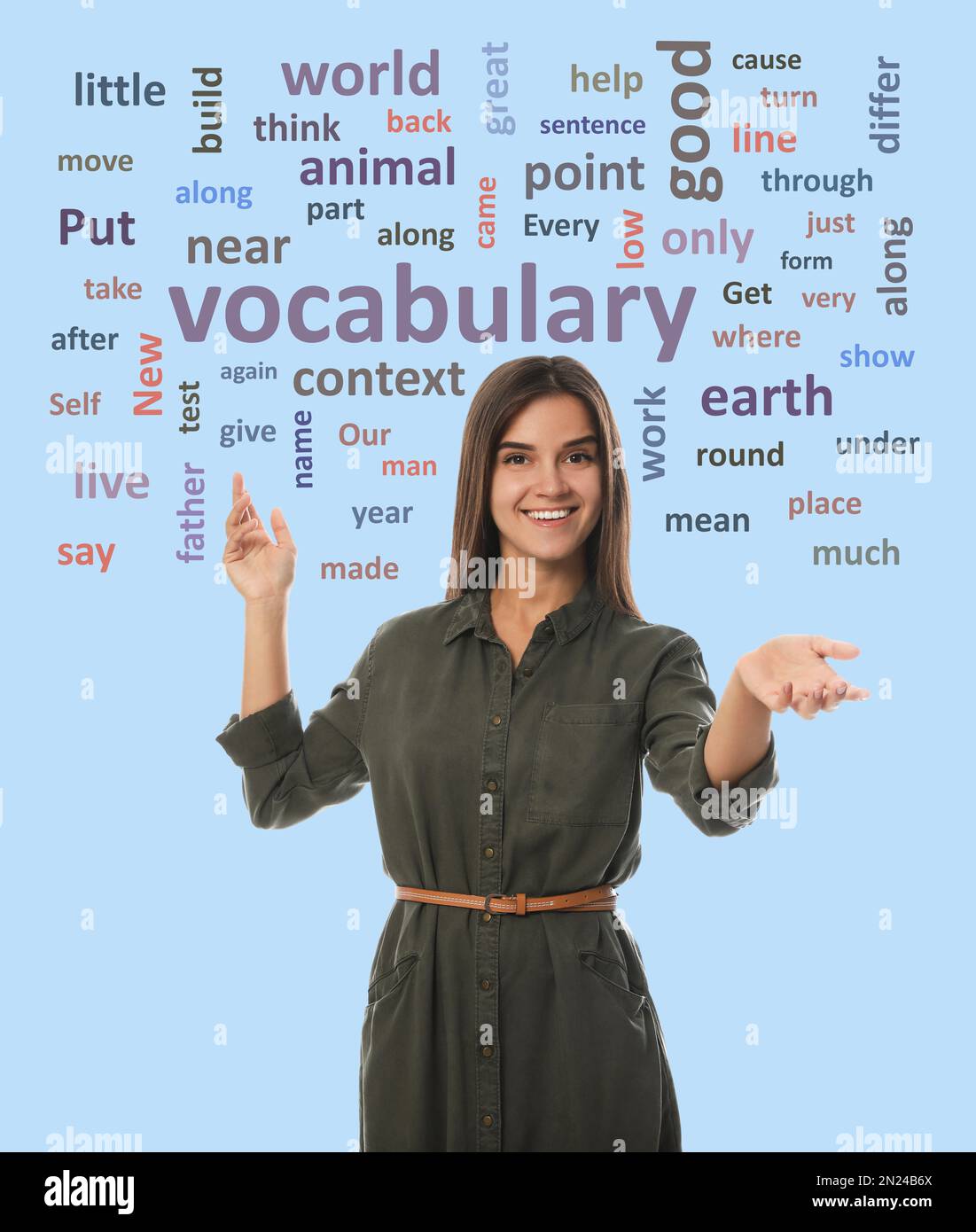 Young woman talking surrounded by word cloud on light blue background ...